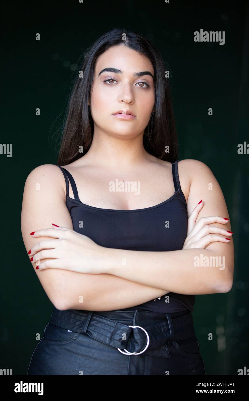 Sad woman arms folded looking hi-res stock photography and images - Alamy