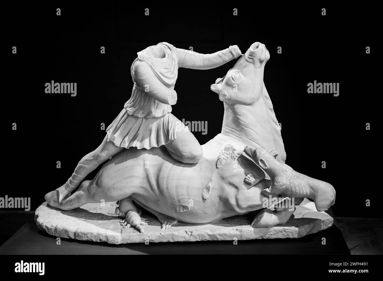 Black and white photo showing in closeup the ruins of ancient sculpture ...