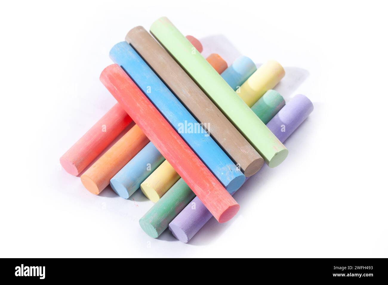 color chalk sticks isolated on white background Stock Photo - Alamy
