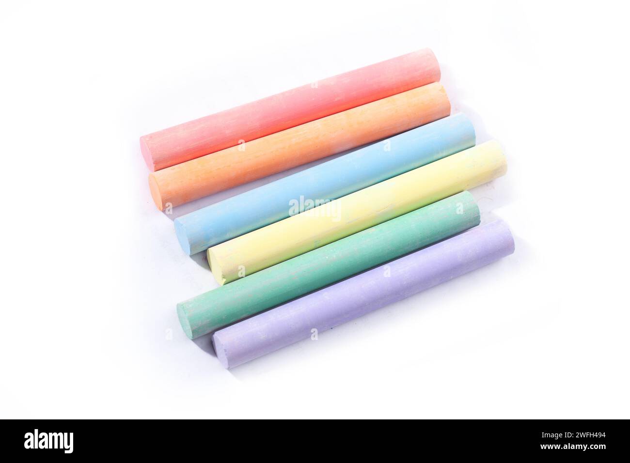 colorful chalk sticks isolated on white background Stock Photo - Alamy