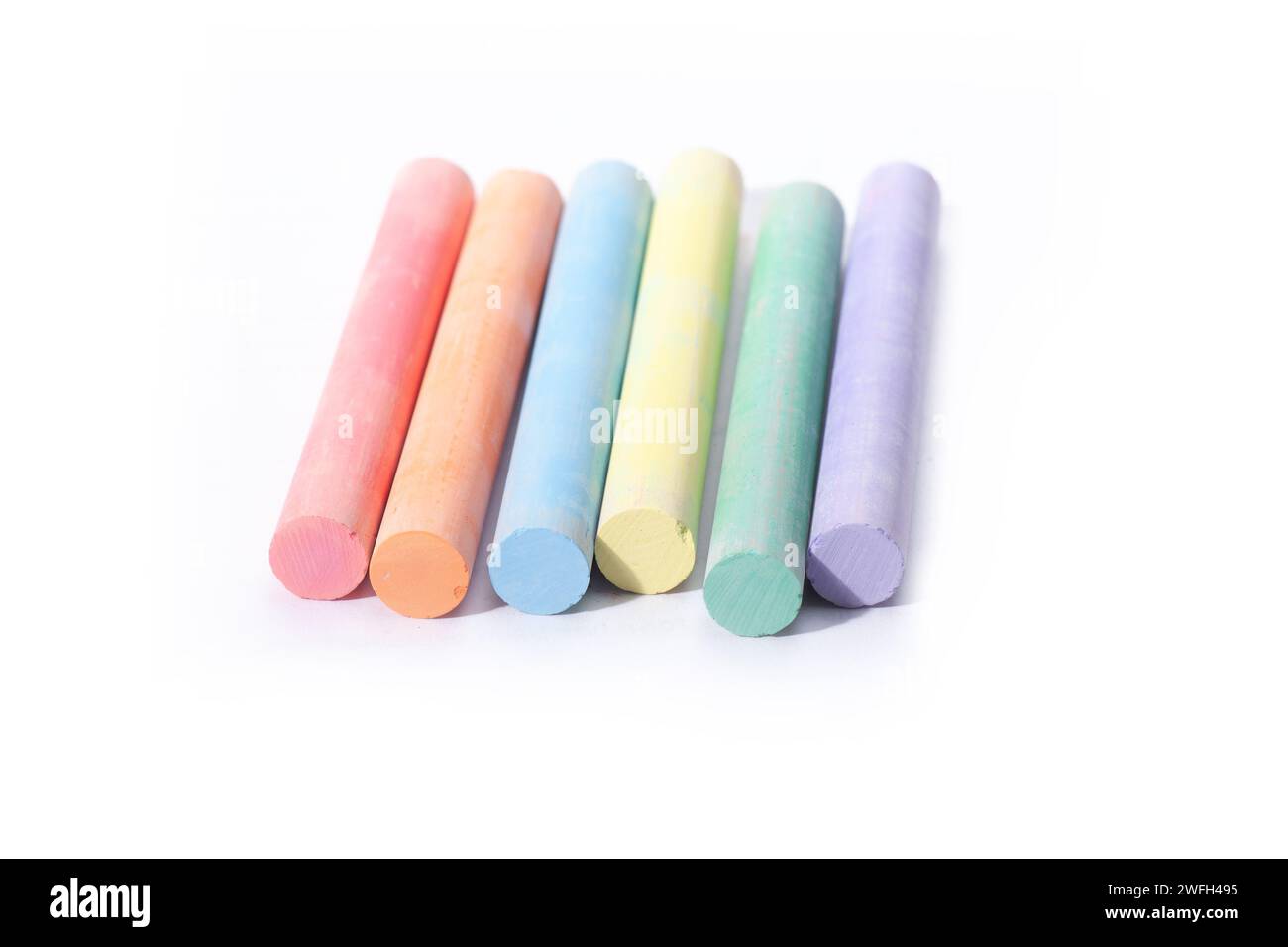colorful chalk sticks isolated on white background Stock Photo - Alamy