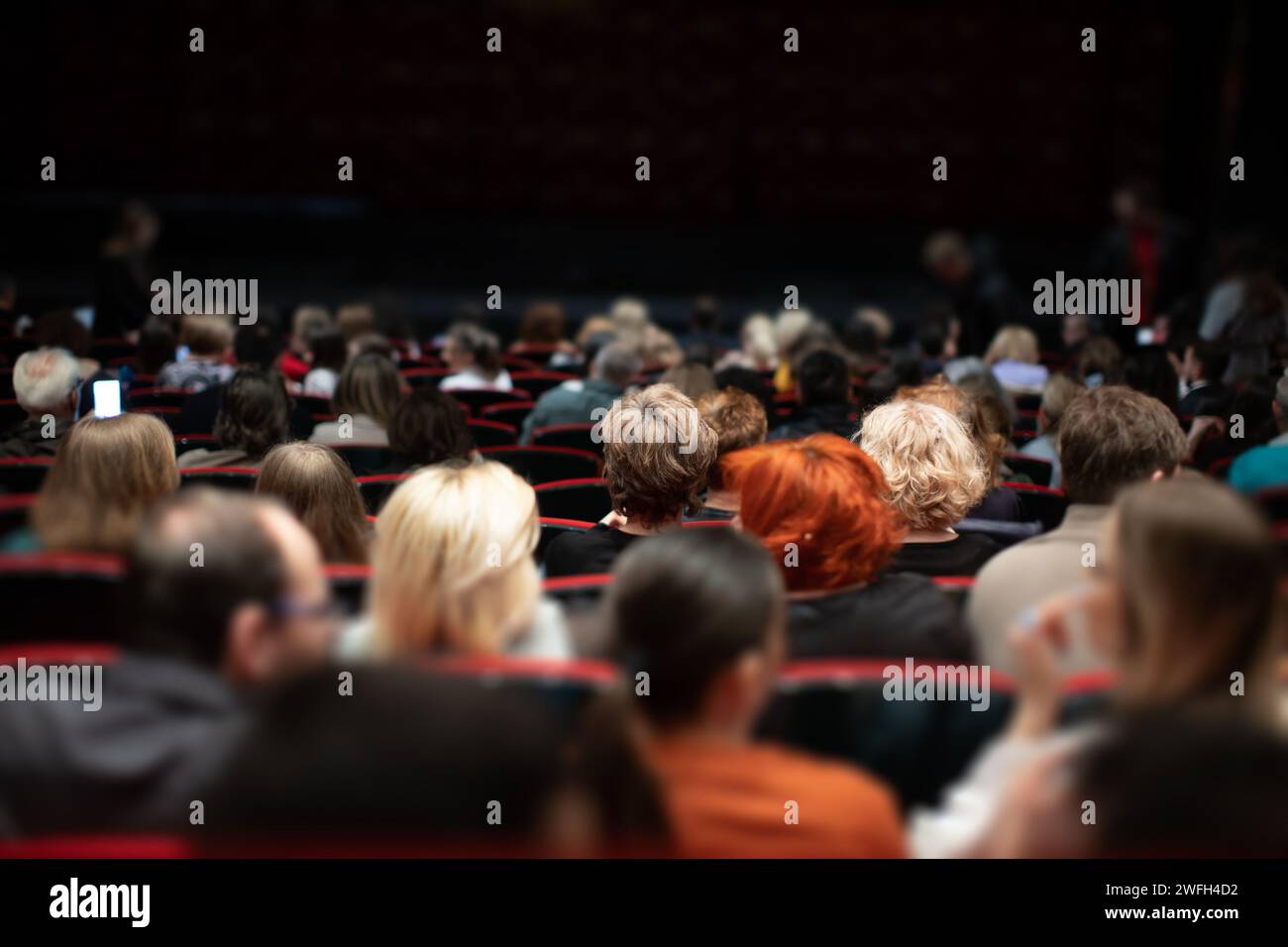 Theater audience seated before performance Stock Photo - Alamy