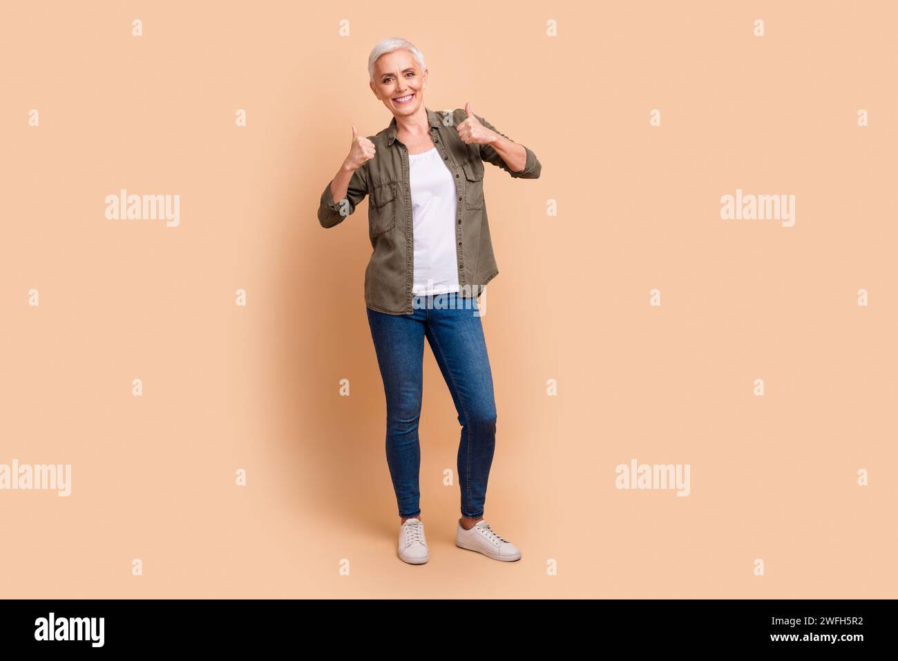 Full length photo of lovely pensioner lady show double thumb up dressed ...