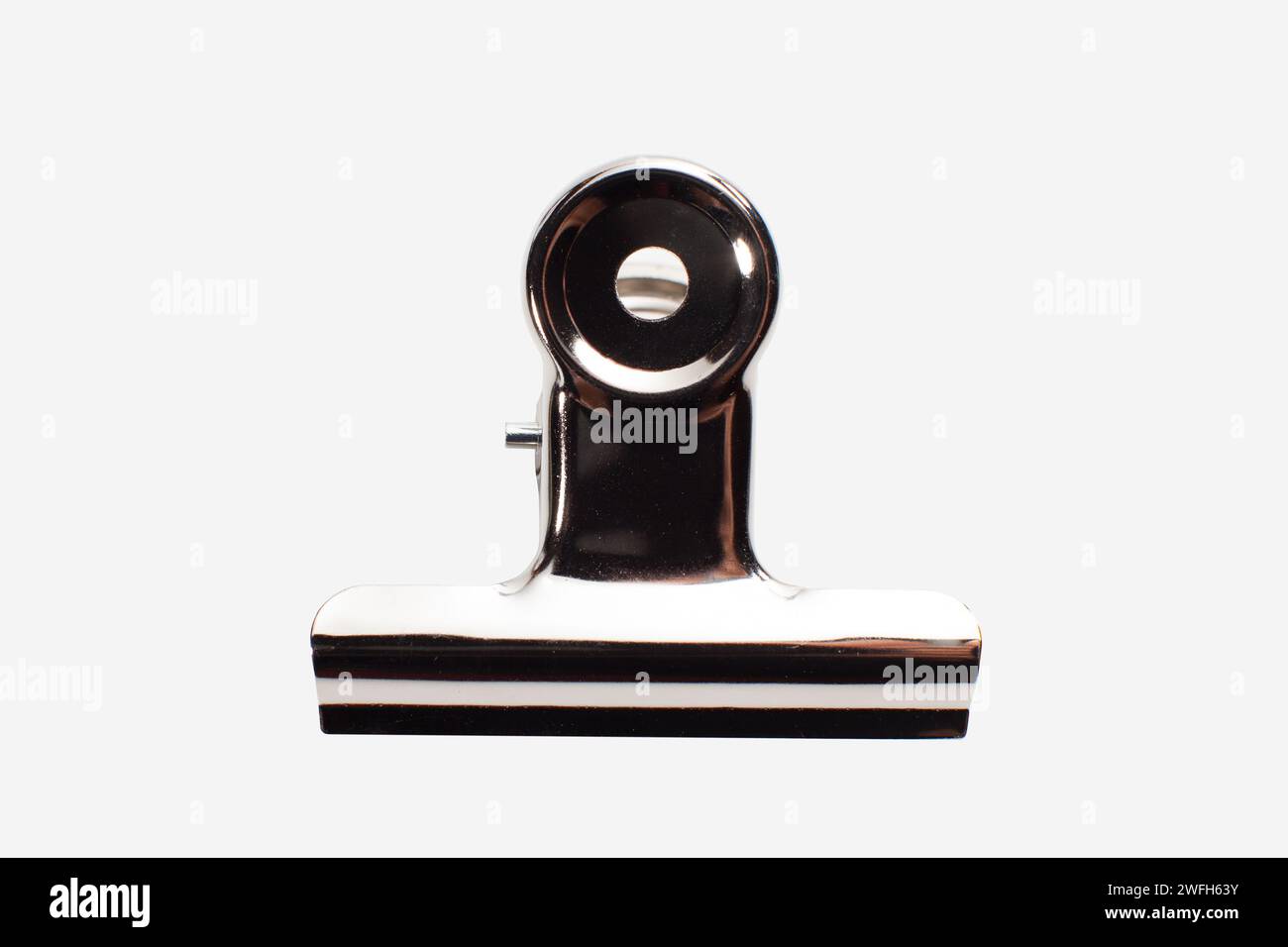 office spring clip isolated on white background Stock Photo - Alamy