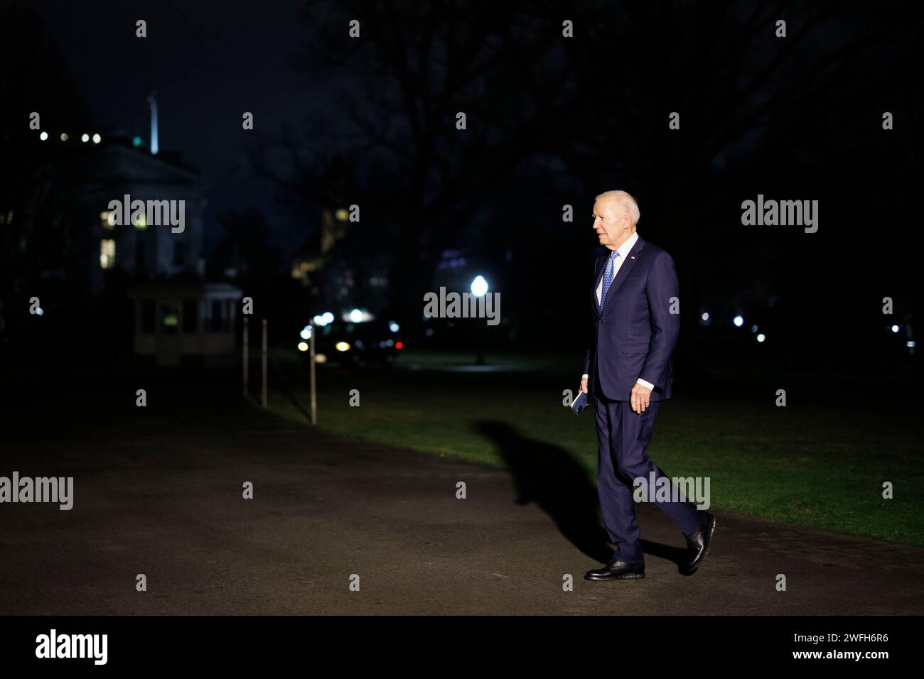 Washington, United States. 30th Jan, 2024. US President Joe Biden walks ...