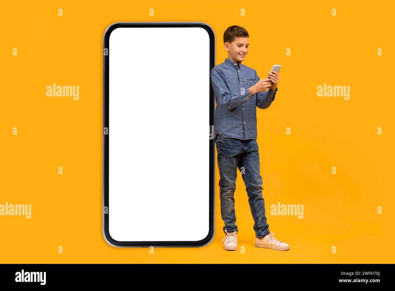 Teen boy smartphone advertising hi-res stock photography and images - Alamy