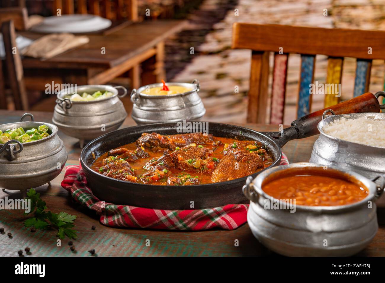 tipical brazilian recipe with farm chicken, gravy, rice and okra ...