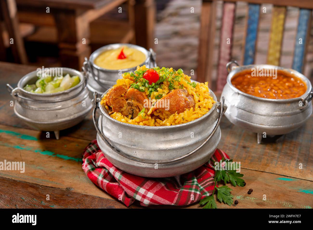 typical brazilian dish ( galinhada ) with curcuma seasoned, chicken and ...