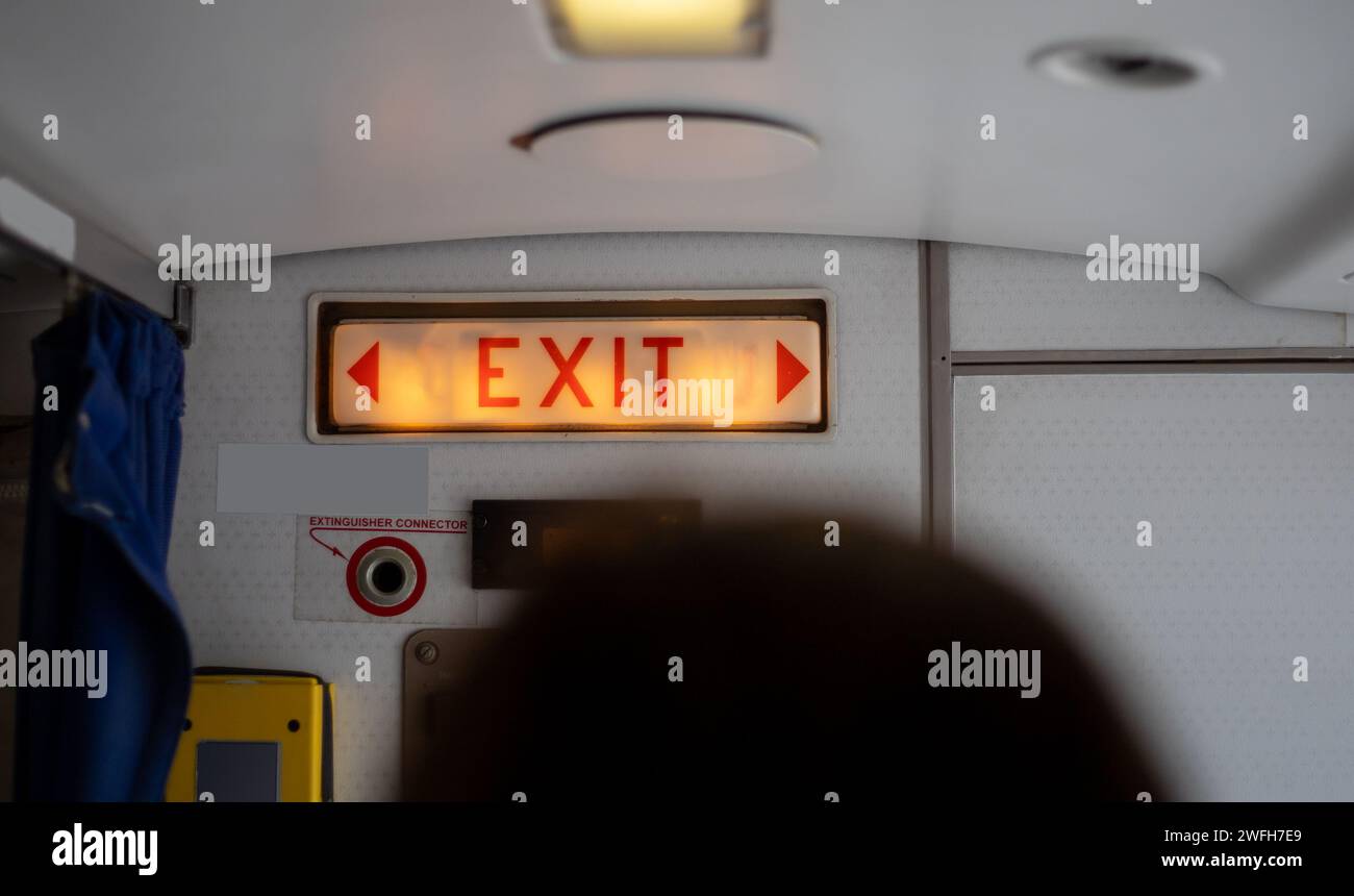 Passenger exiting airplane hi-res stock photography and images - Alamy