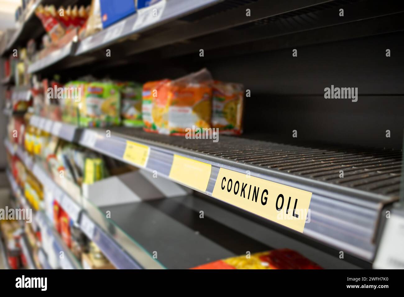 empty cooking oil shelf in supermarket display Stock Photo - Alamy