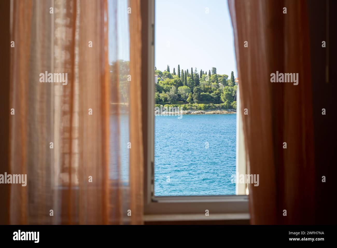 sea and island view from open window Stock Photo - Alamy
