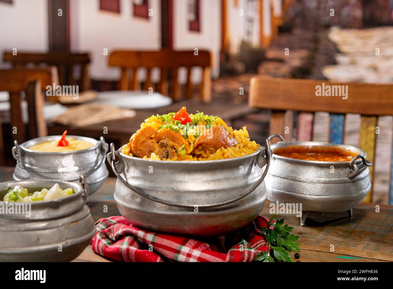 typical brazilian dish ( galinhada ) with curcuma seasoned, chicken and ...