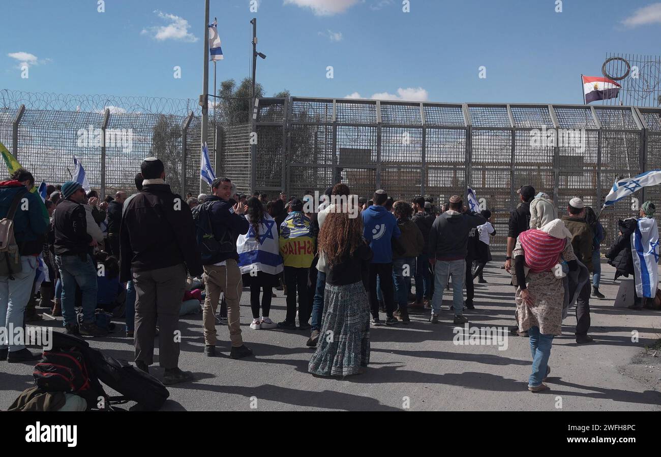 Israeli protesters gather by the border fence with Egypt at the Nitzana ...