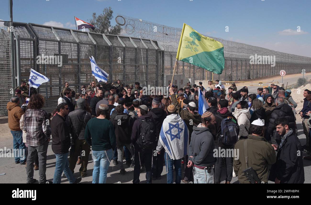 Israeli protesters gather by the border fence with Egypt at the Nitzana ...
