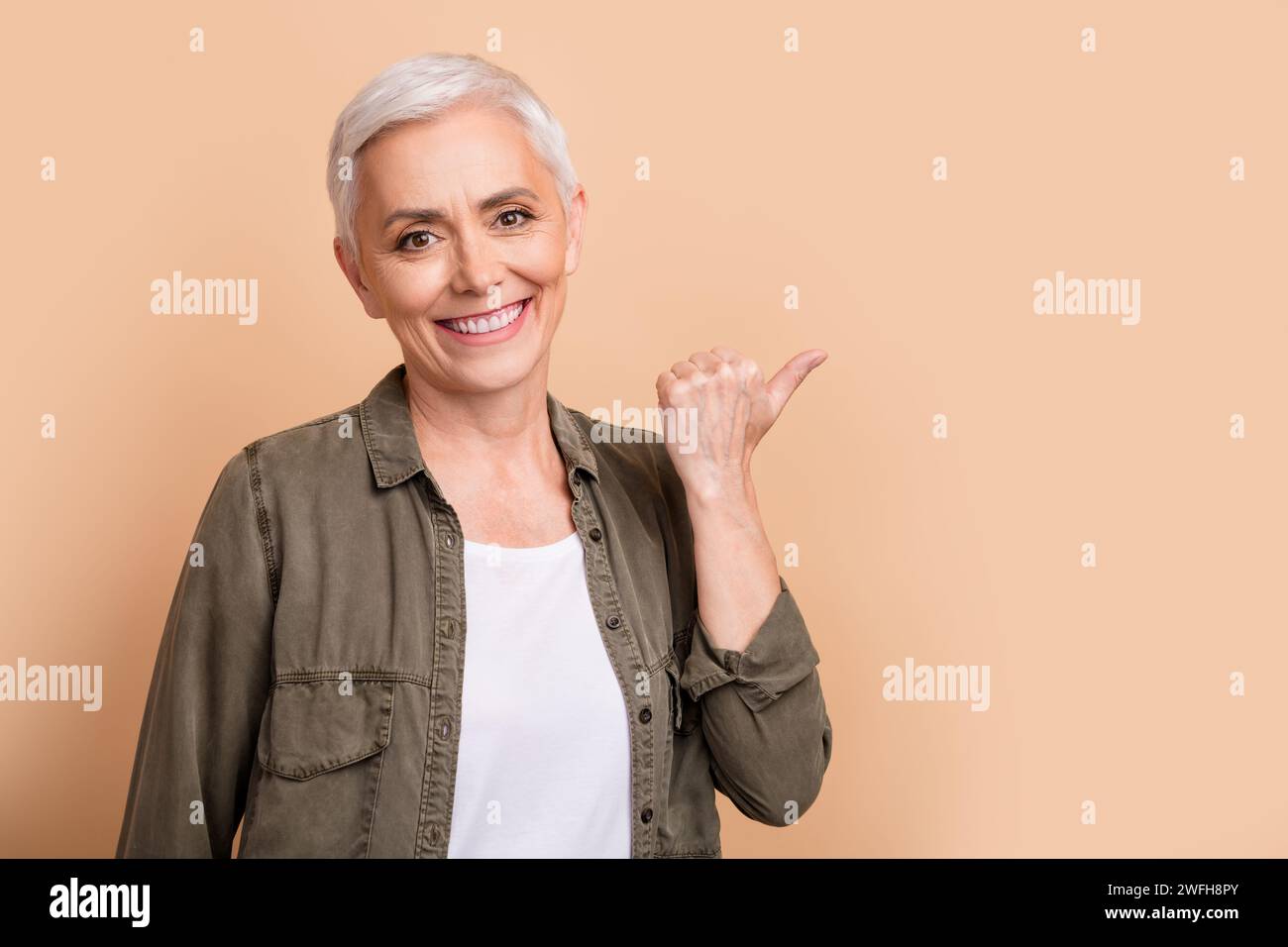 Portrait of business lady khaki shirt indicate finger empty space her ...