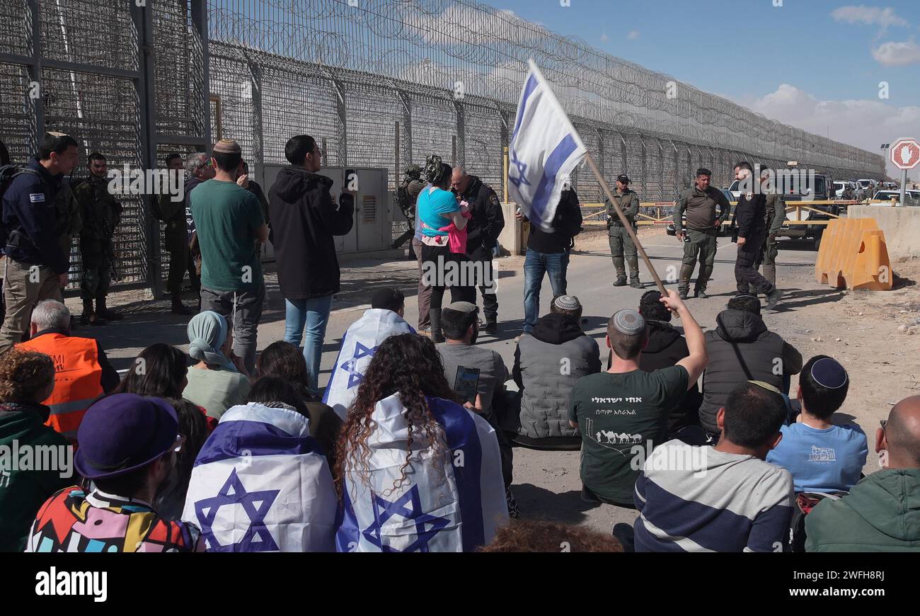 Israeli protesters gather by the border fence with Egypt at the Nitzana ...