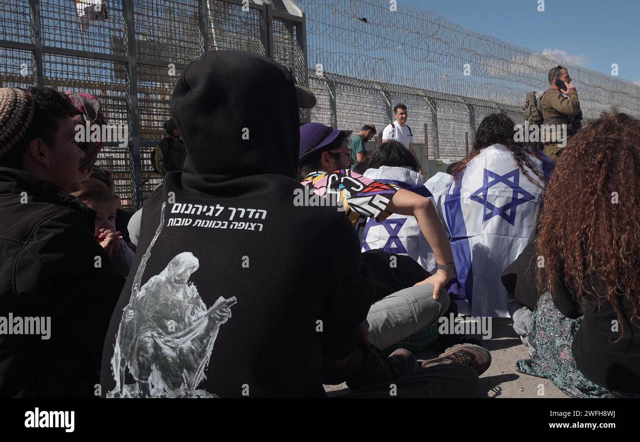 Israeli protesters gather by the border fence with Egypt at the Nitzana ...