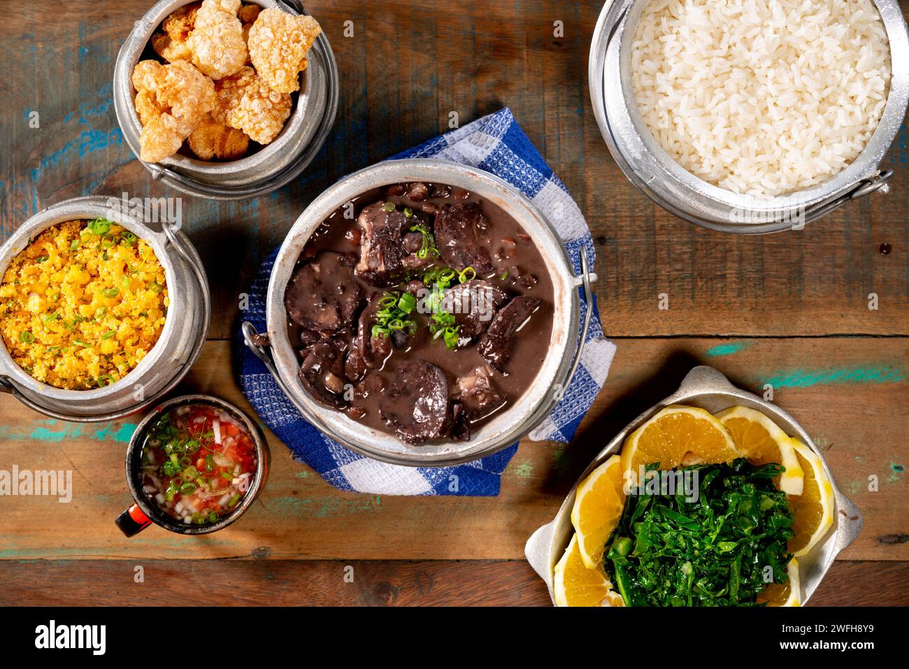 Typical Brazilian dish feijoada based on black beans and pork with ...