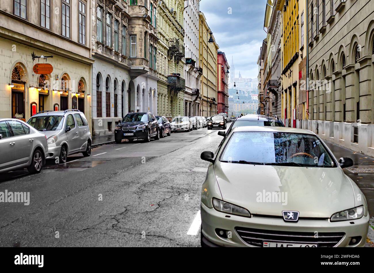 Parking cars on the street in Budapest Stock Photo - Alamy