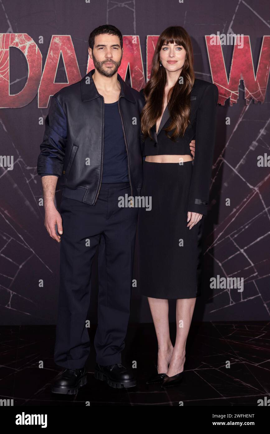 Tahar Rahim, left and Dakota Johnson pose for photographers during a ...
