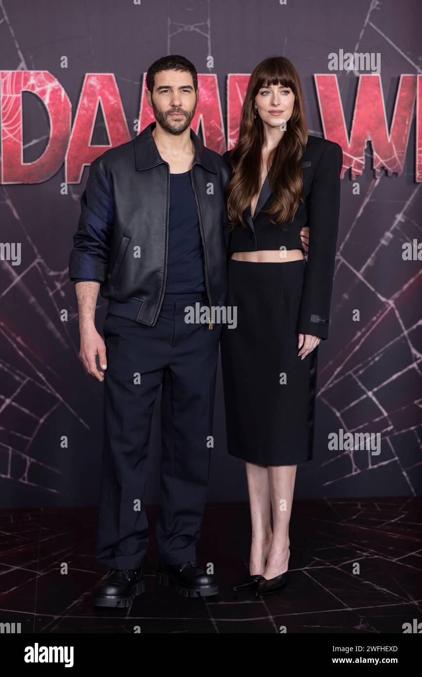 Tahar Rahim, left and Dakota Johnson pose for photographers during a ...