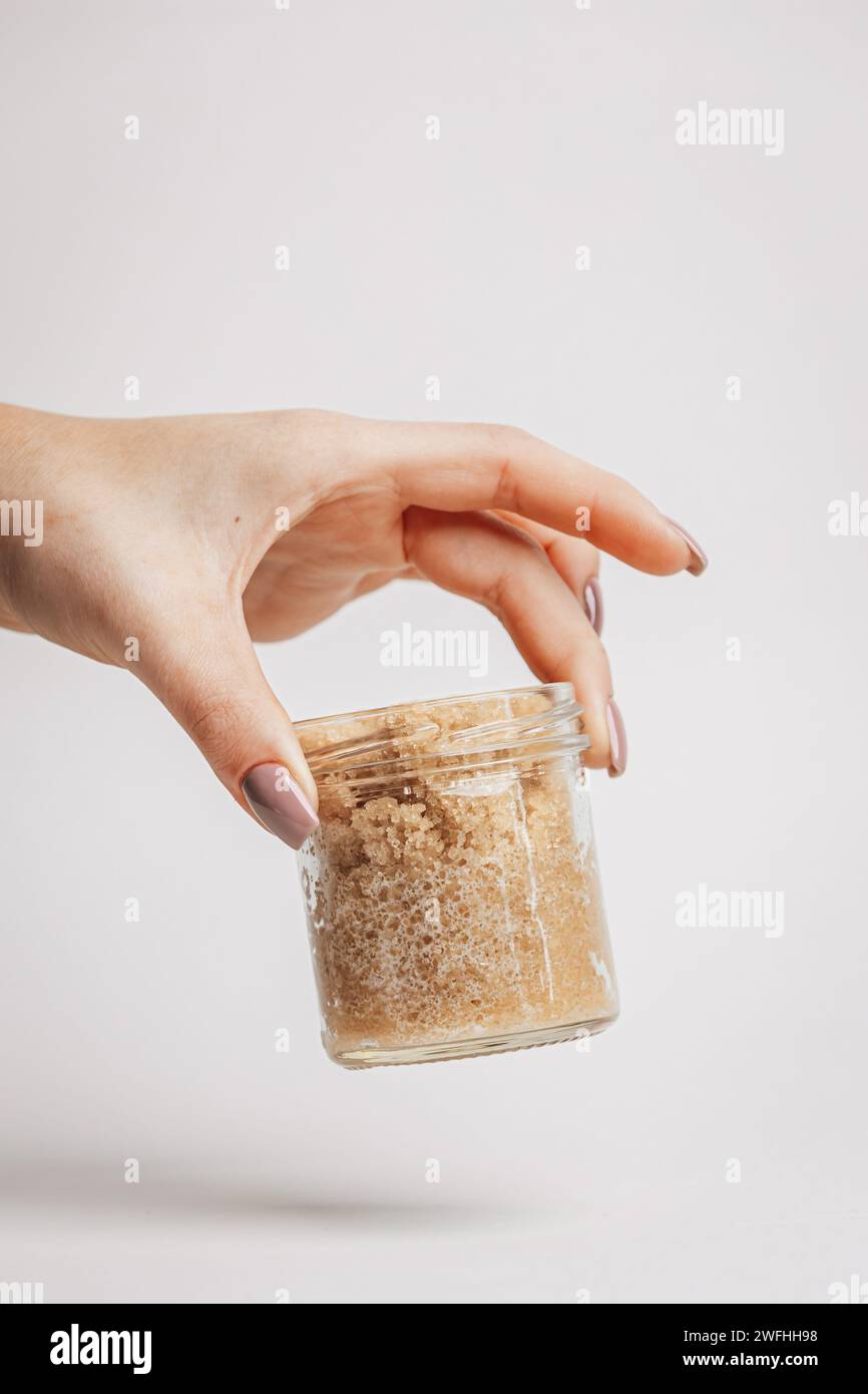 Woman scrubbing body hi-res stock photography and images - Alamy