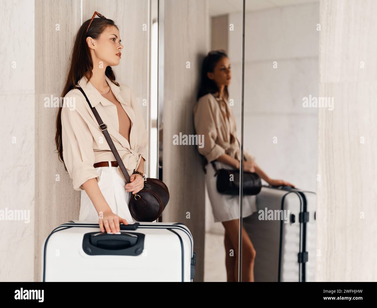 Togetherness at the Airport: Young Female Tourist and Businesswoman ...