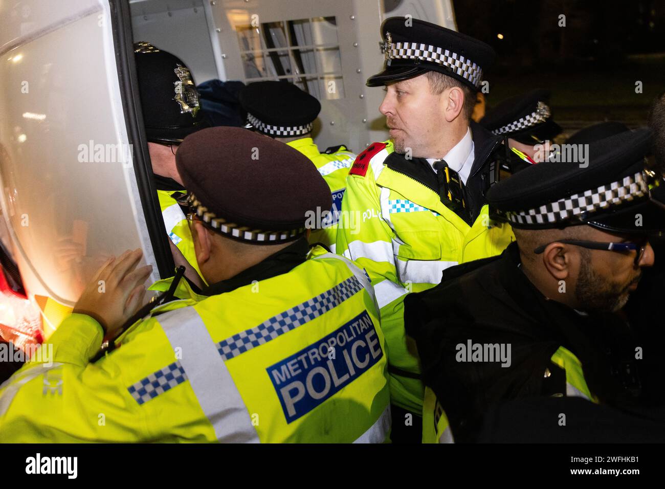 London, UK. 30th January, 2024. Metropolitan Police officers arrest a ...