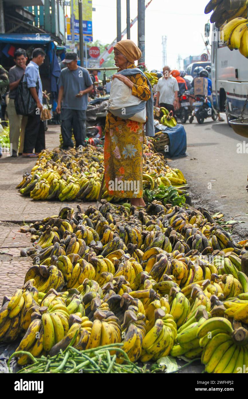 Lots of bananas for sale on a sidewalk in Bandung, West Java, Indonesia ...