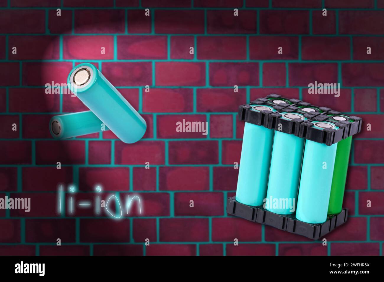 Lithium battery pack floating in the air on the background of red brick ...