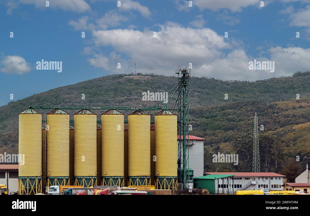 Grain silos outside next to a highway road Stock Photo - Alamy