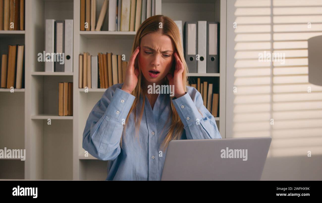 Caucasian female student girl studying working home office library ...