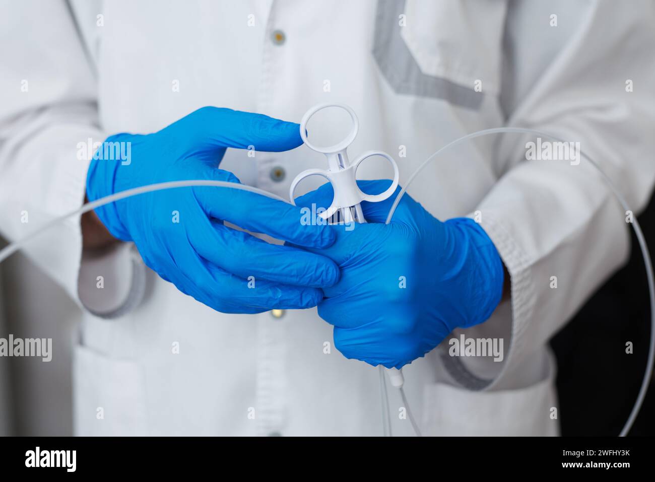 doctor puts a plaster on the arm of a patient in the hospital with a ...