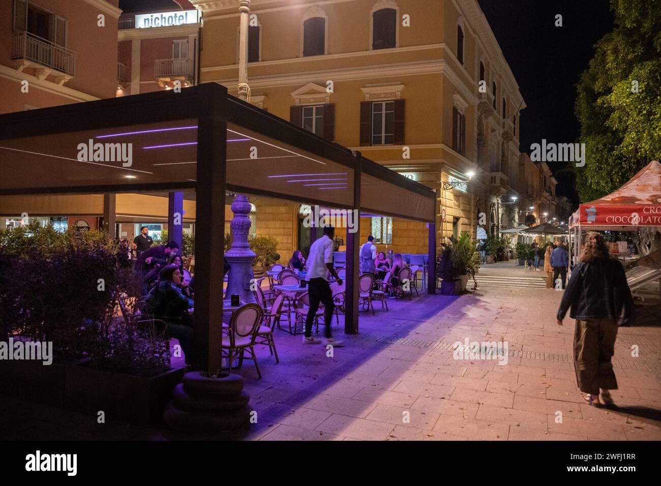 Covered street side restaurant, Carloforte, San Pietro Island, Sardinia ...