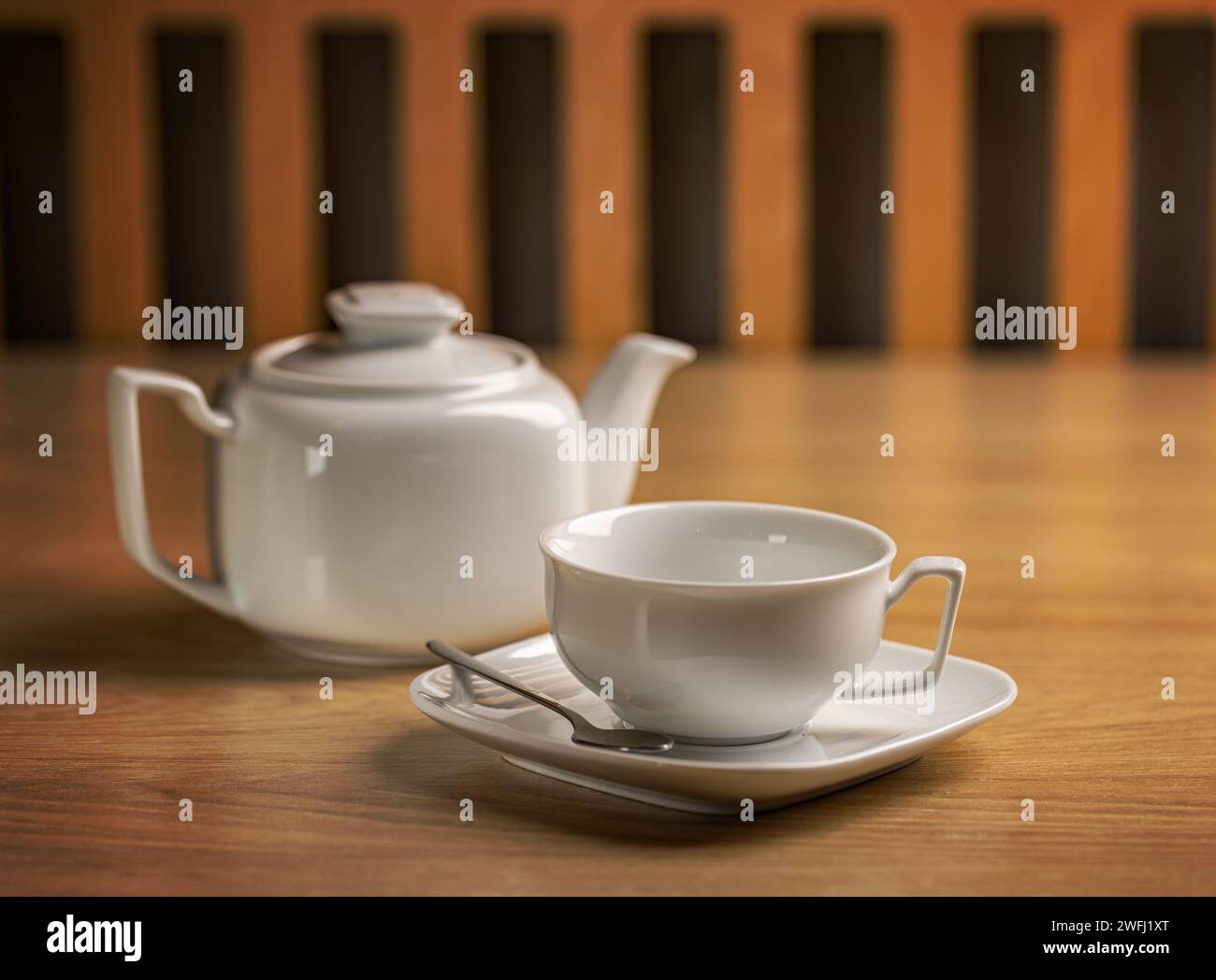 Tea concept with white tea set of cups and teapot Stock Photo - Alamy