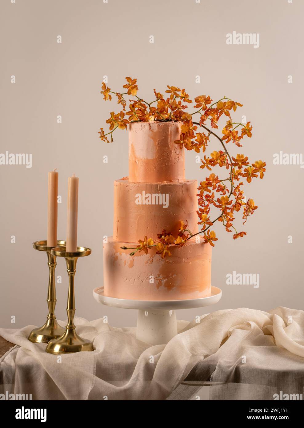 Tiered cake for wedding. Beautiful peach fuzz colored festive cake ...