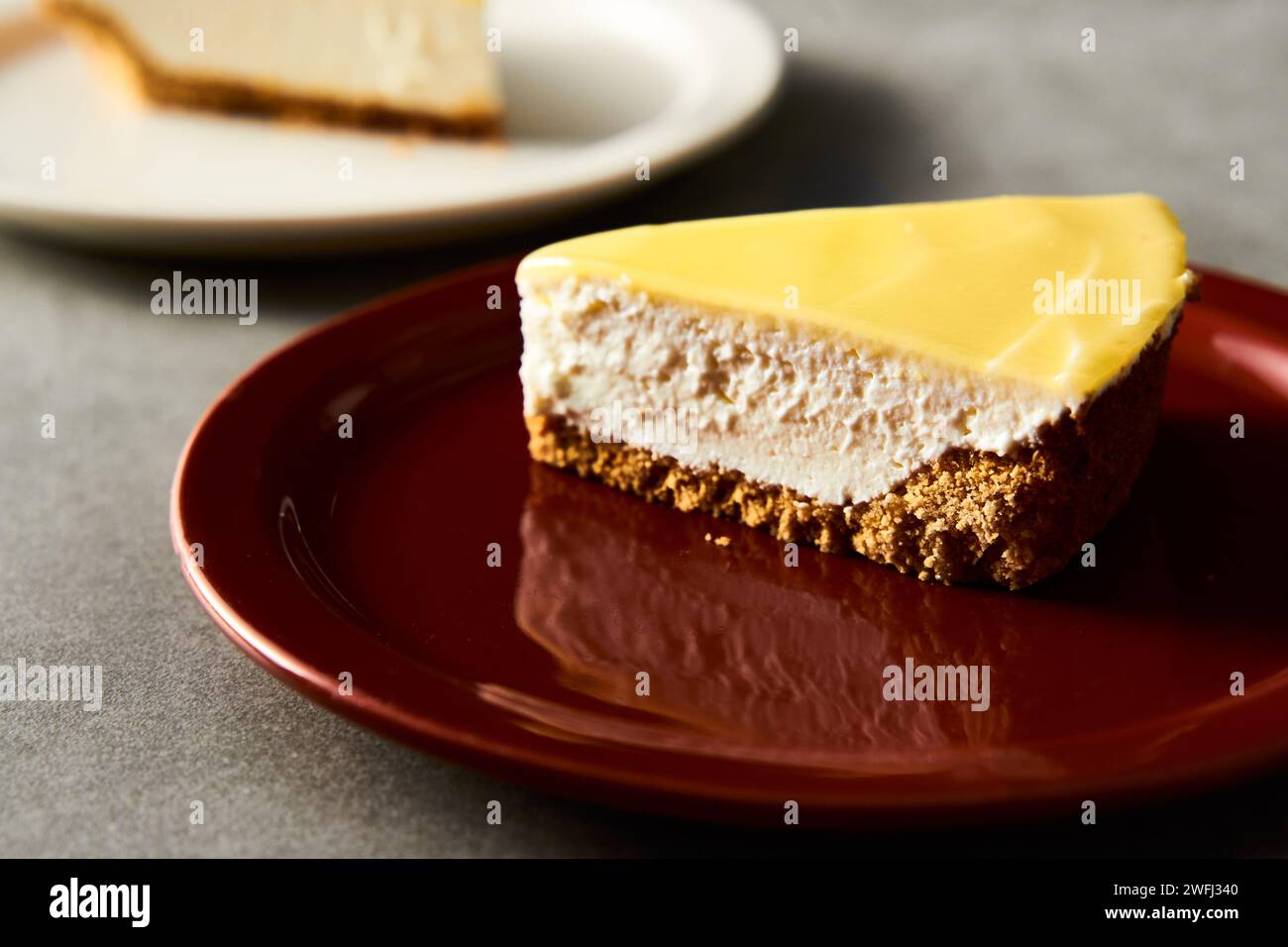 Mascarpone cheesecake with lemon curd and shortbread base Stock Photo ...