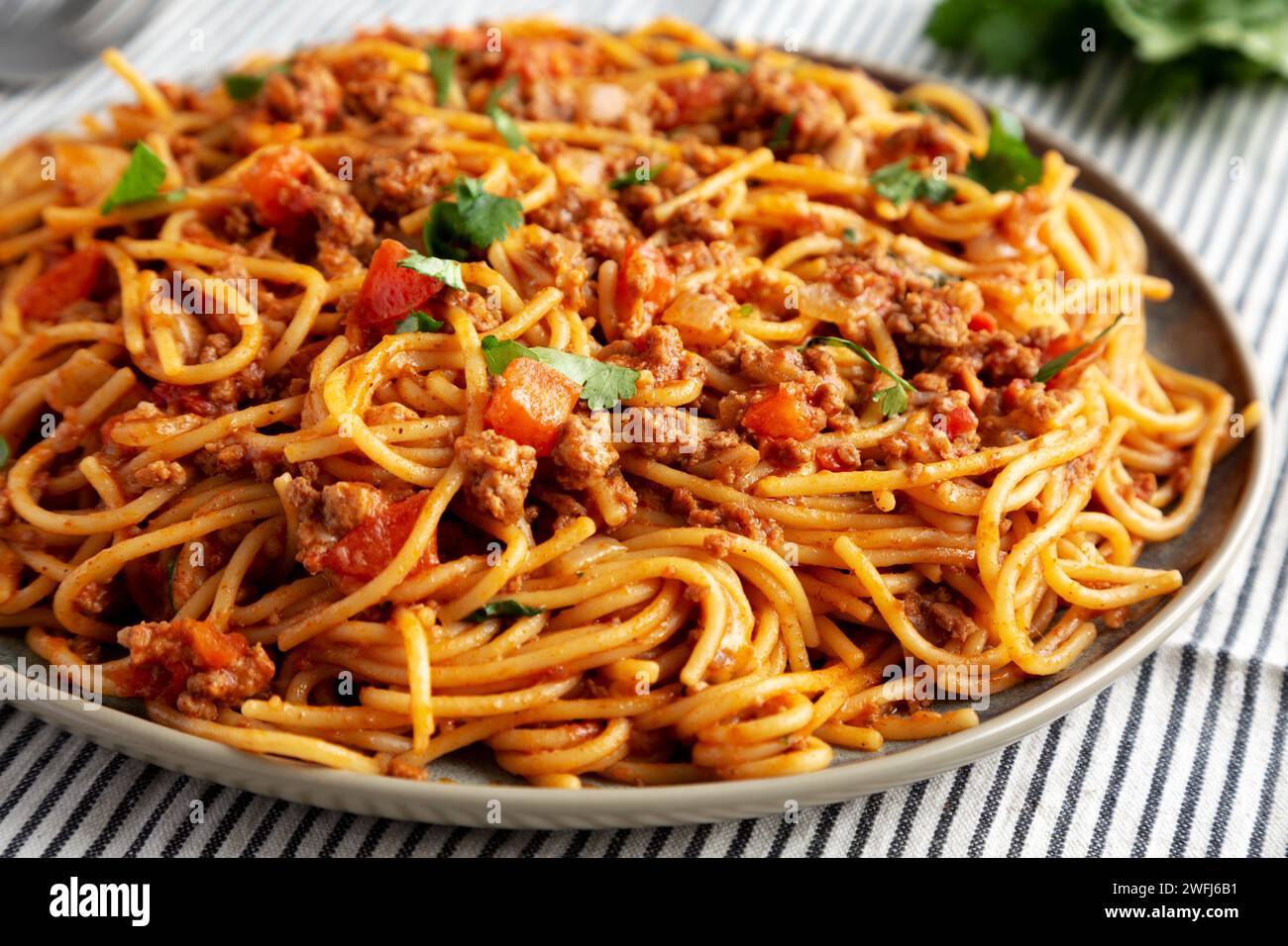 Homemade One-Pot Taco Spaghetti on a Plate, side view Stock Photo - Alamy