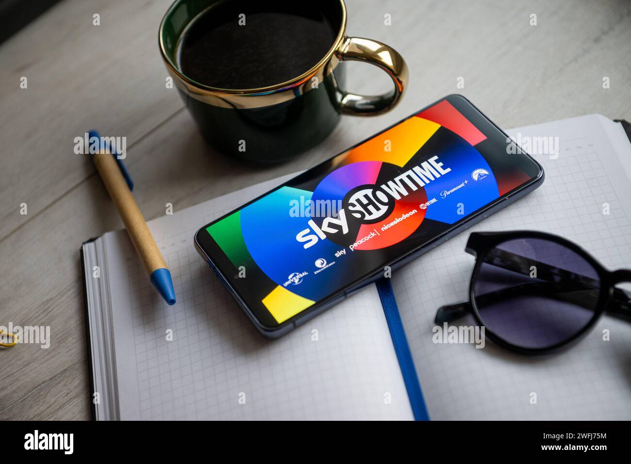 In this photo illustration a Sky Showtime logo seen displayed on a ...