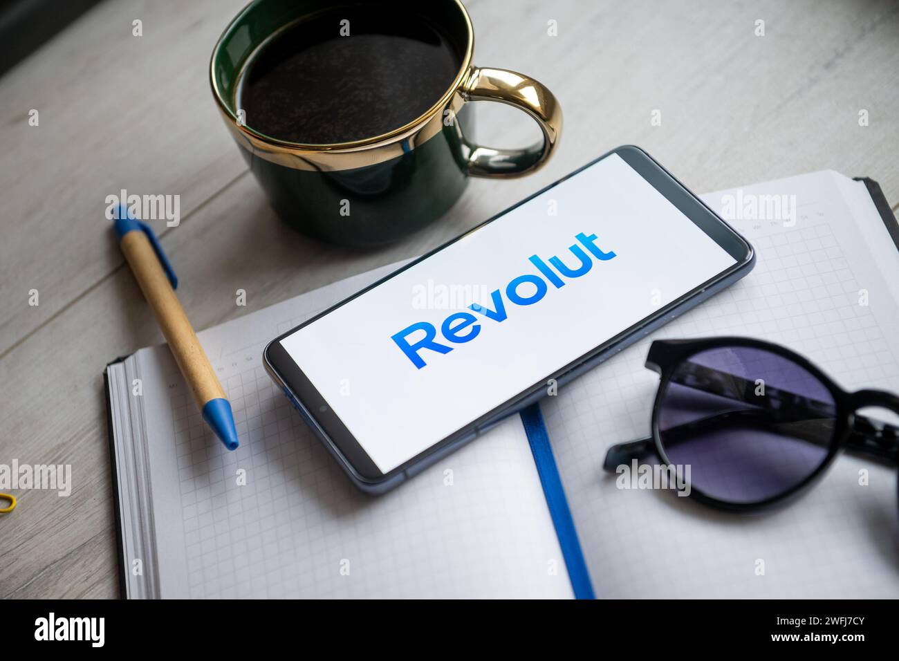 In this photo illustration a Revolut logo seen displayed on a ...