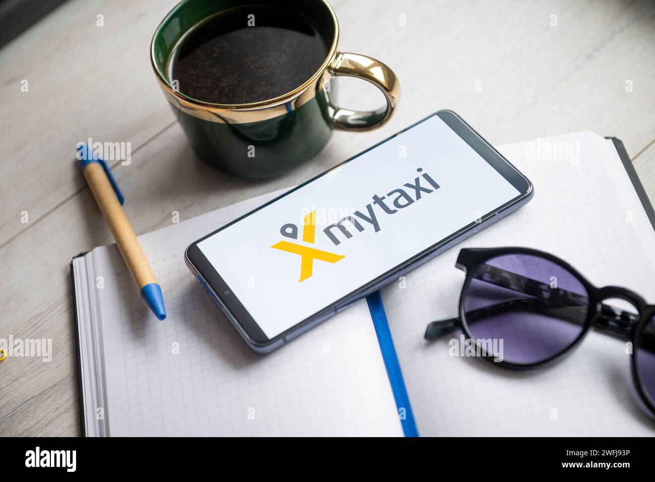 In this photo illustration a MyTaxi logo seen displayed on a smartphone ...