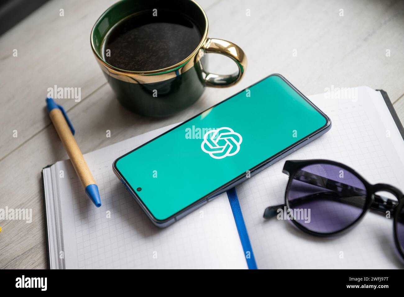 In this photo illustration an Open AI Chat GPT logo seen displayed on a ...