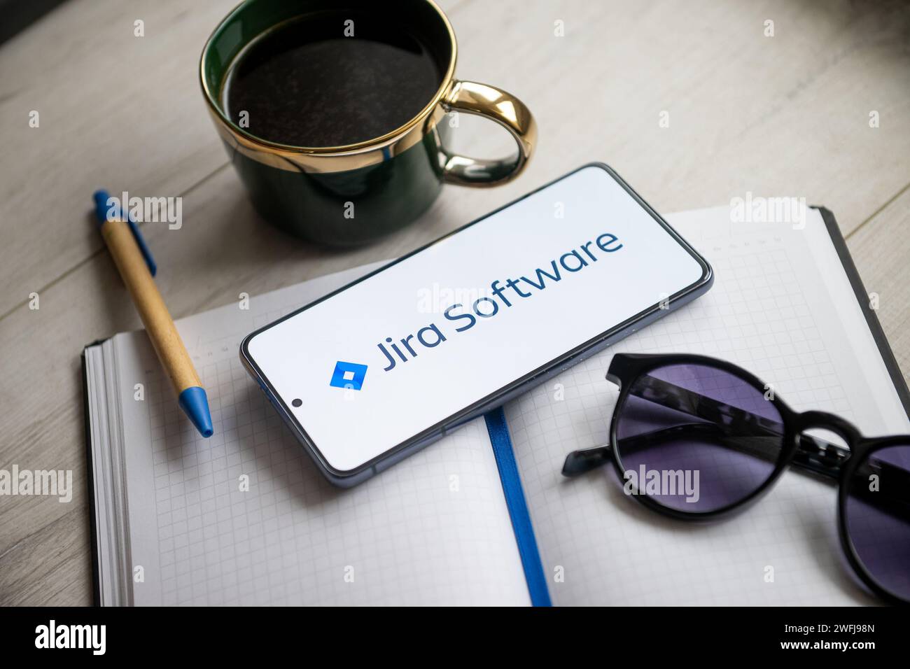 In this photo illustration a Jira Software logo seen displayed on a ...