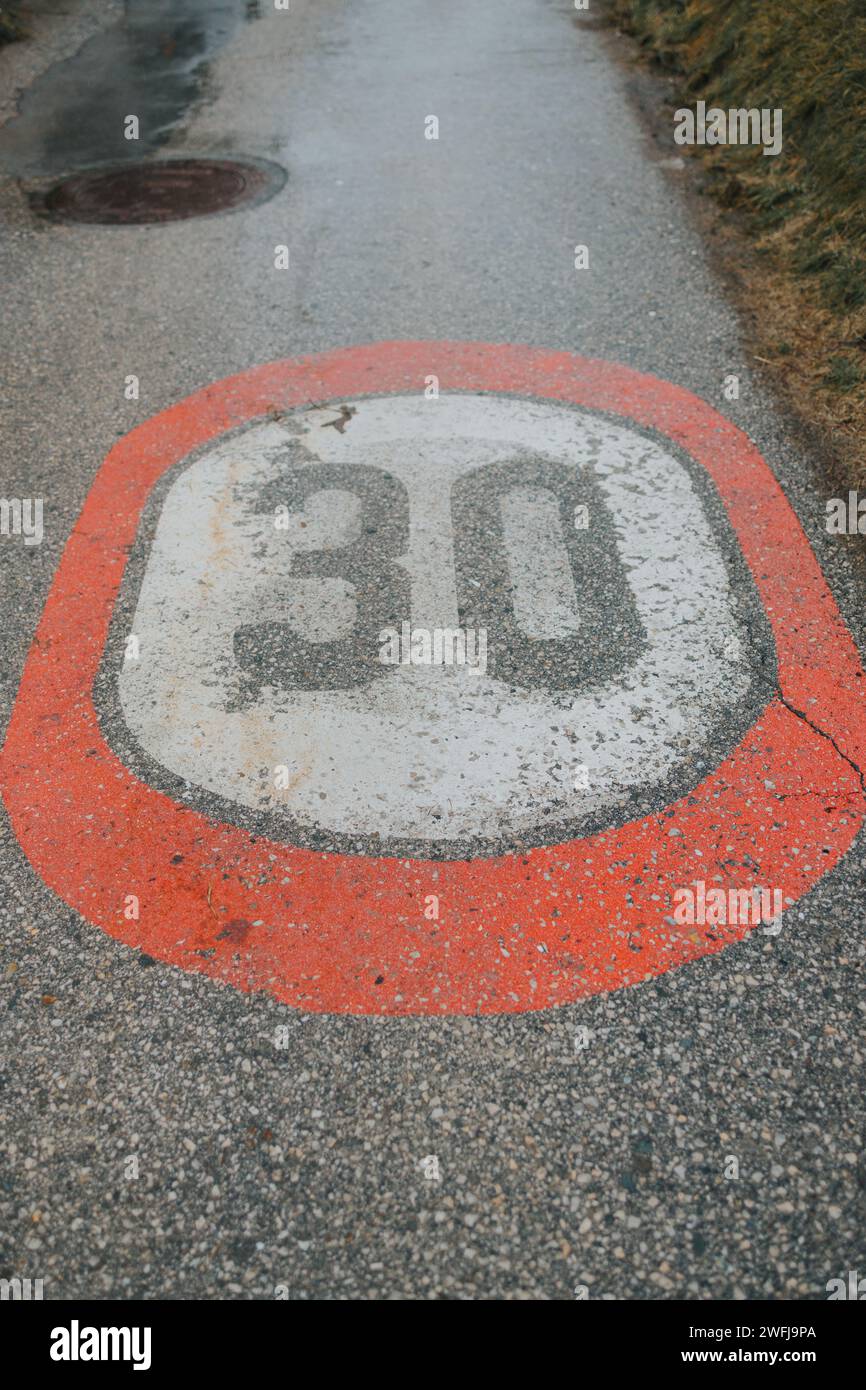Speed limit sign on residential street sidewalk Stock Photo - Alamy