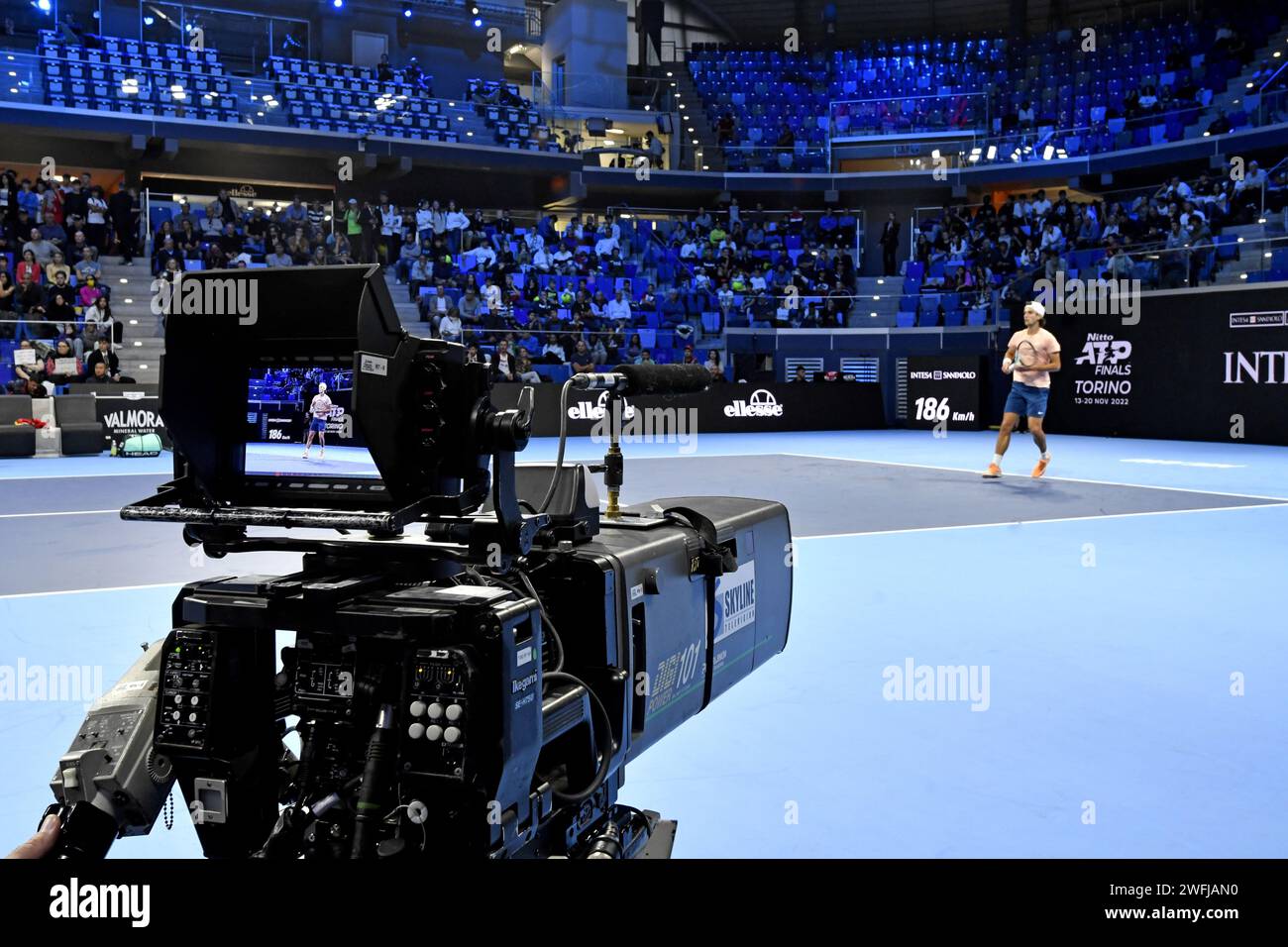 Camera tv operator recording a tennis match at the Allianz Cloud Arena ...