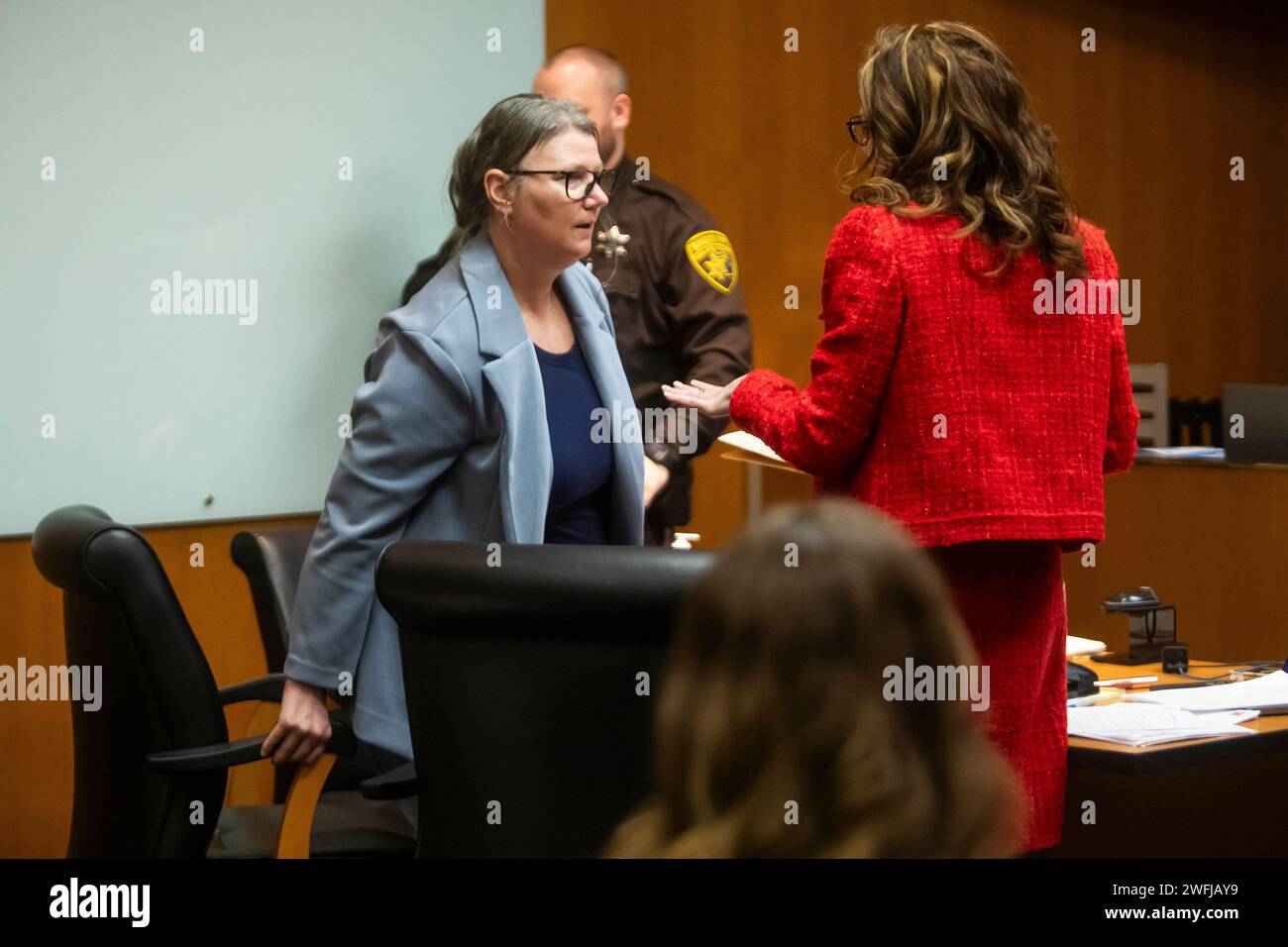 Defendant Jennifer Crumbley, left, enters the courtroom for her trial ...