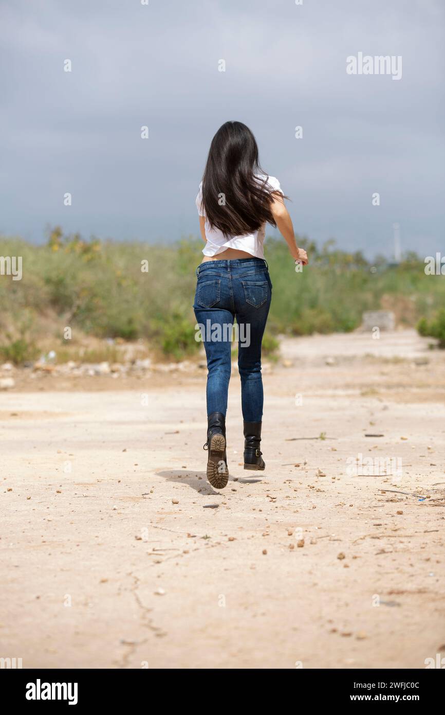 Middle eastern teenager running hi-res stock photography and images - Alamy