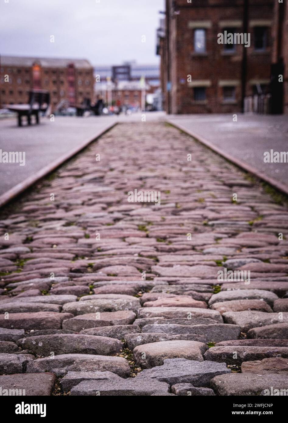 An original cobbled path at thehistoric docks at Gloucester in winter ...