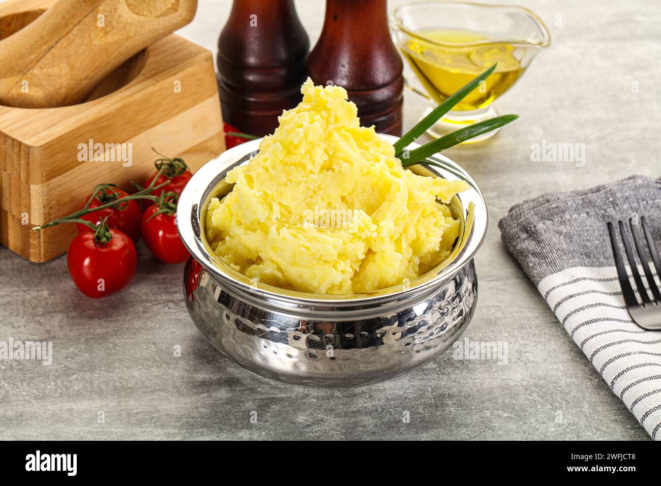 Mashed potato Puree with butter served green onion Stock Photo - Alamy