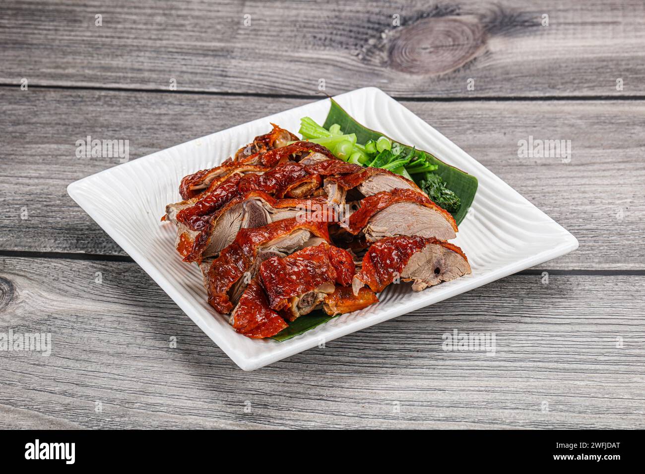 Asian cuisine - roasted duck meat with skin Stock Photo - Alamy